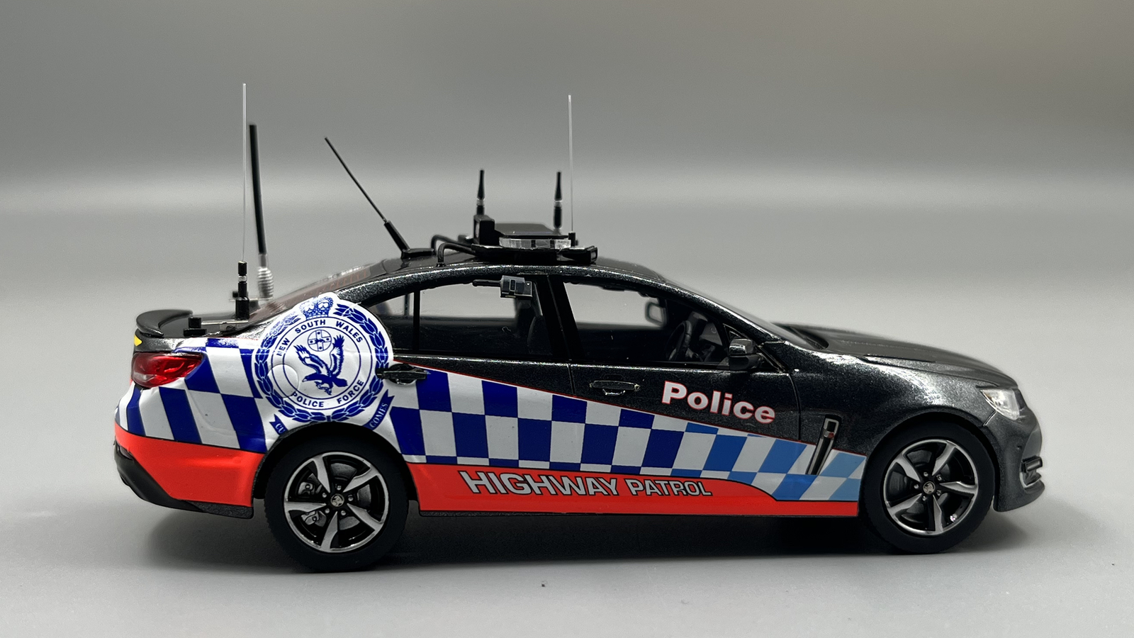 1:43 NSW Police Highway Patrol 2018 VF Series II Commodore Sedan Grey
