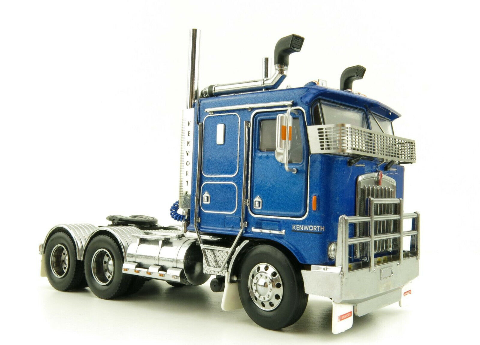 New 1:50 K100G Kenworth Metallic Blue With Black Chassis & CAT Engine
